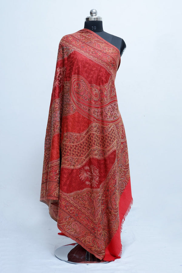 Red colour jamawar shawl with kashmiri aari work looks/ elegant.