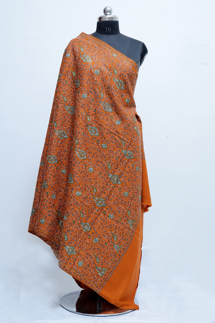 Orange colour sozni shawl with richly embroidered border and jaal