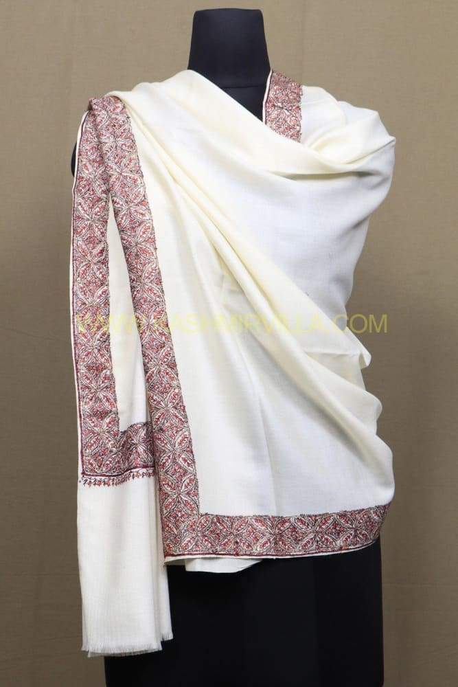 Offwhite colour base with attractive sozni embroidery on border looks